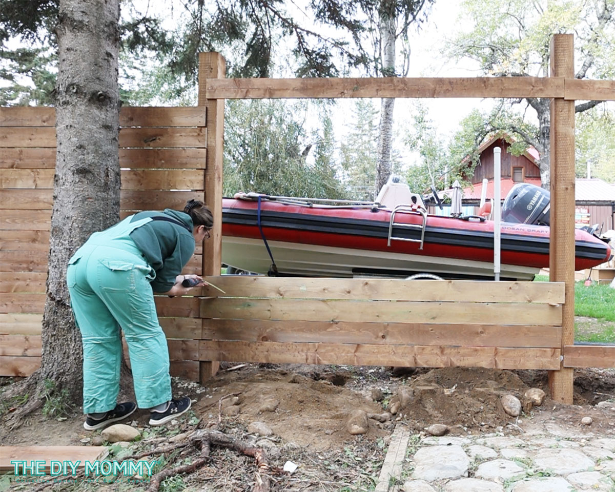How We Built a Modern DIY Horizontal Slat Fence - Cozy DIY Home