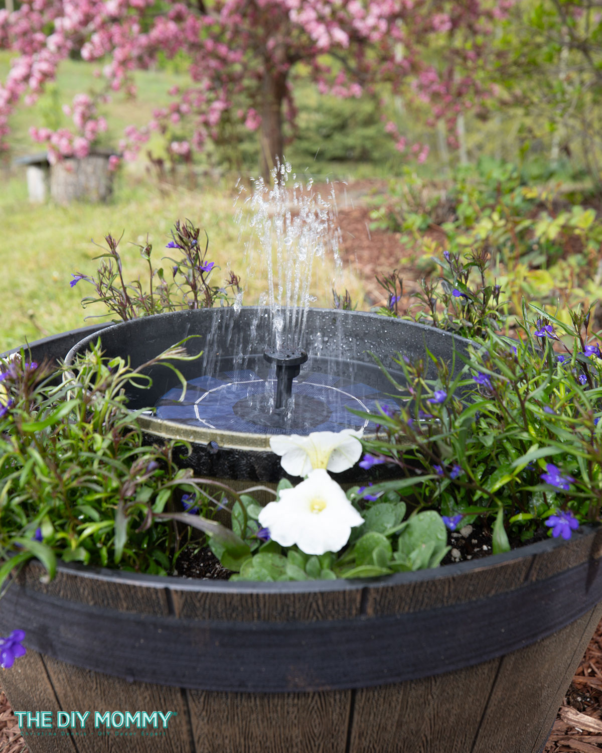 Make an Easy DIY Solar Water Fountain Planter - Cozy DIY Home